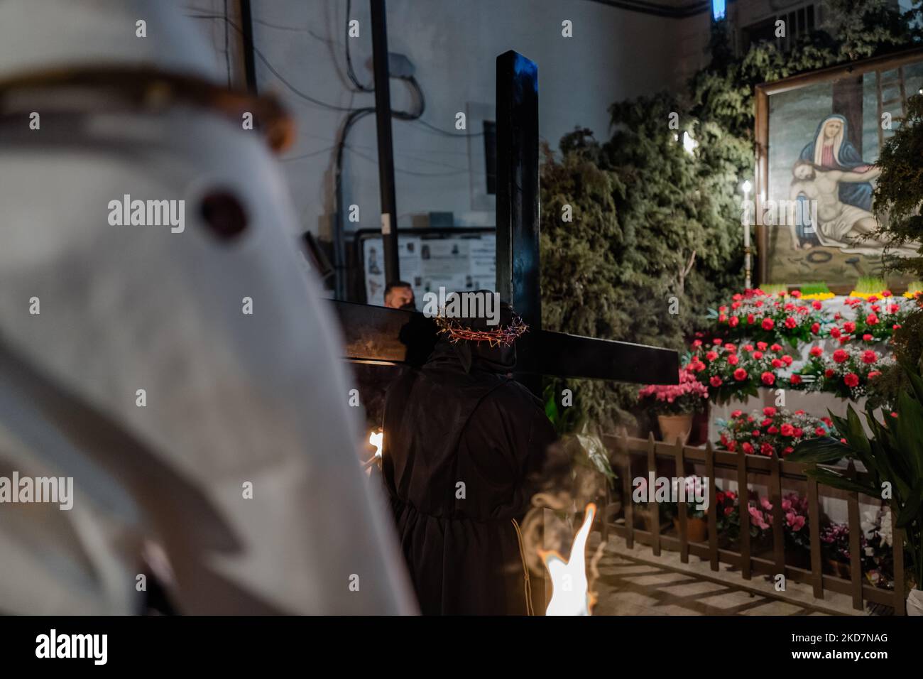 The first crucifer makes a bow in front of a tomb in Noicattaro on ...
