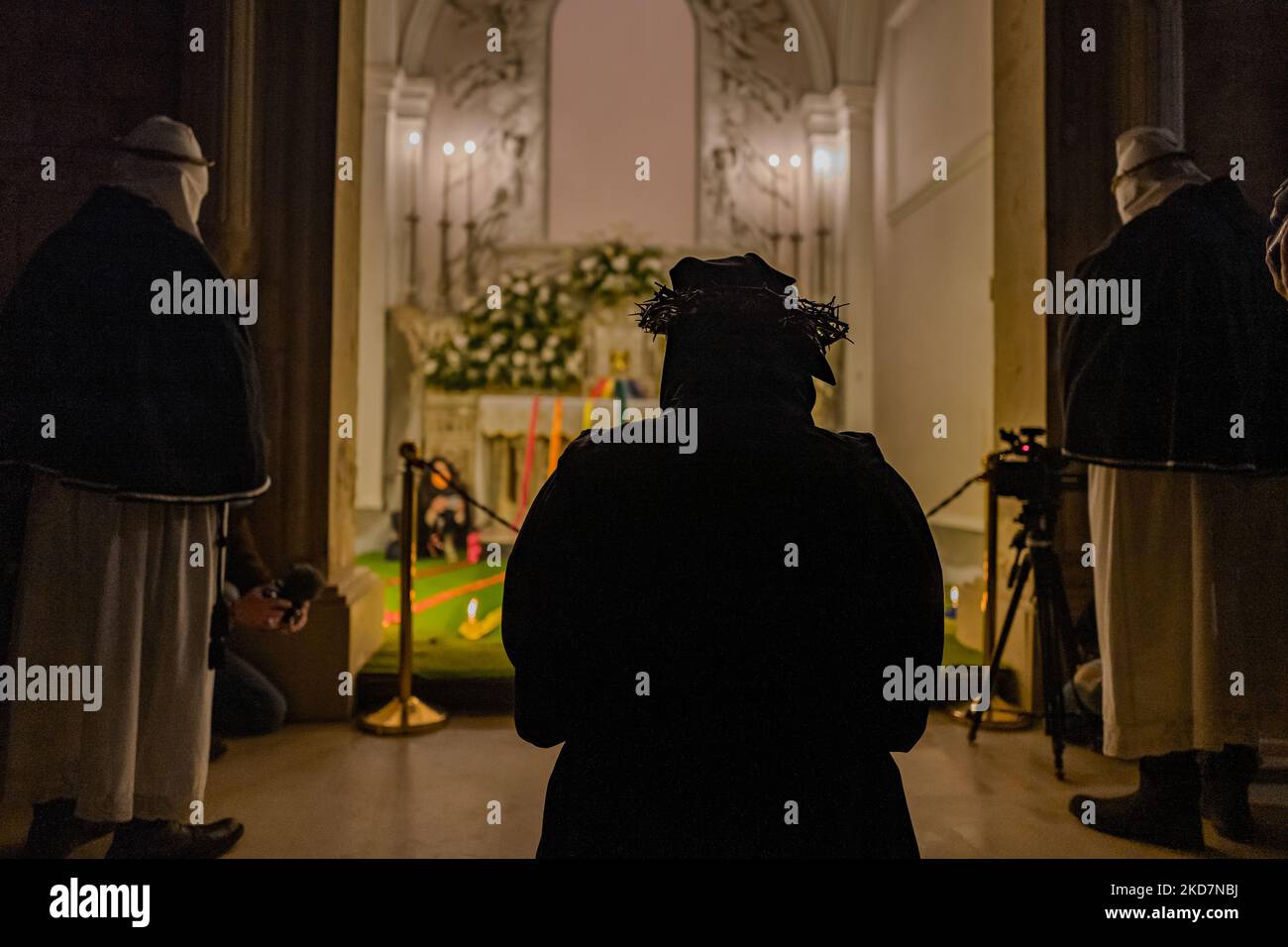 The first crucifer enters the Church, kneeling prays and then scourging ...