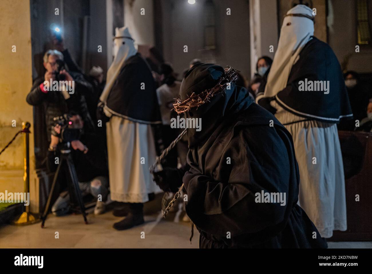 The first crucifer during the flagellation phase with the chain in the ...