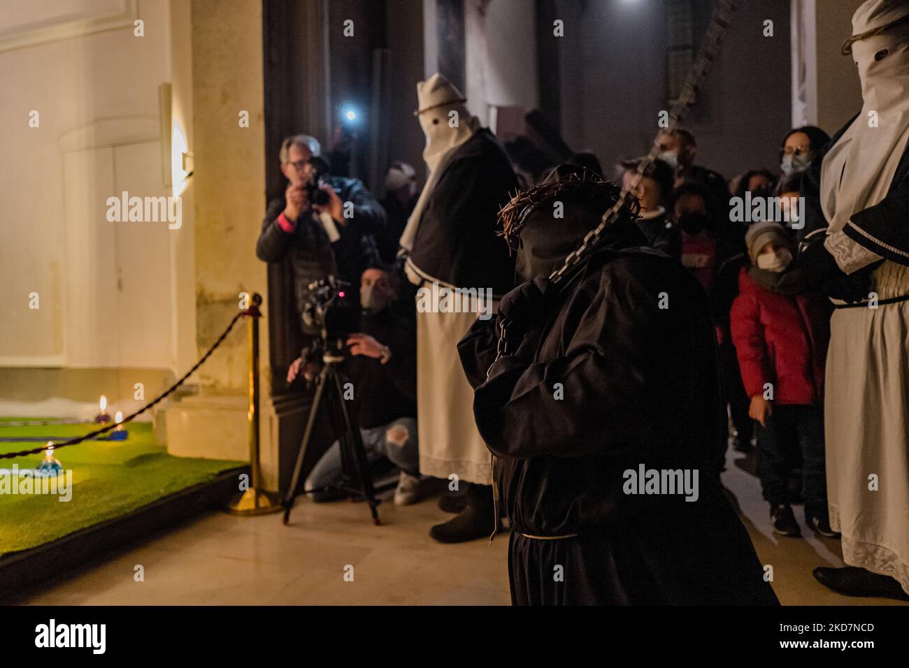 The first crucifer during the flagellation phase with the chain in the ...