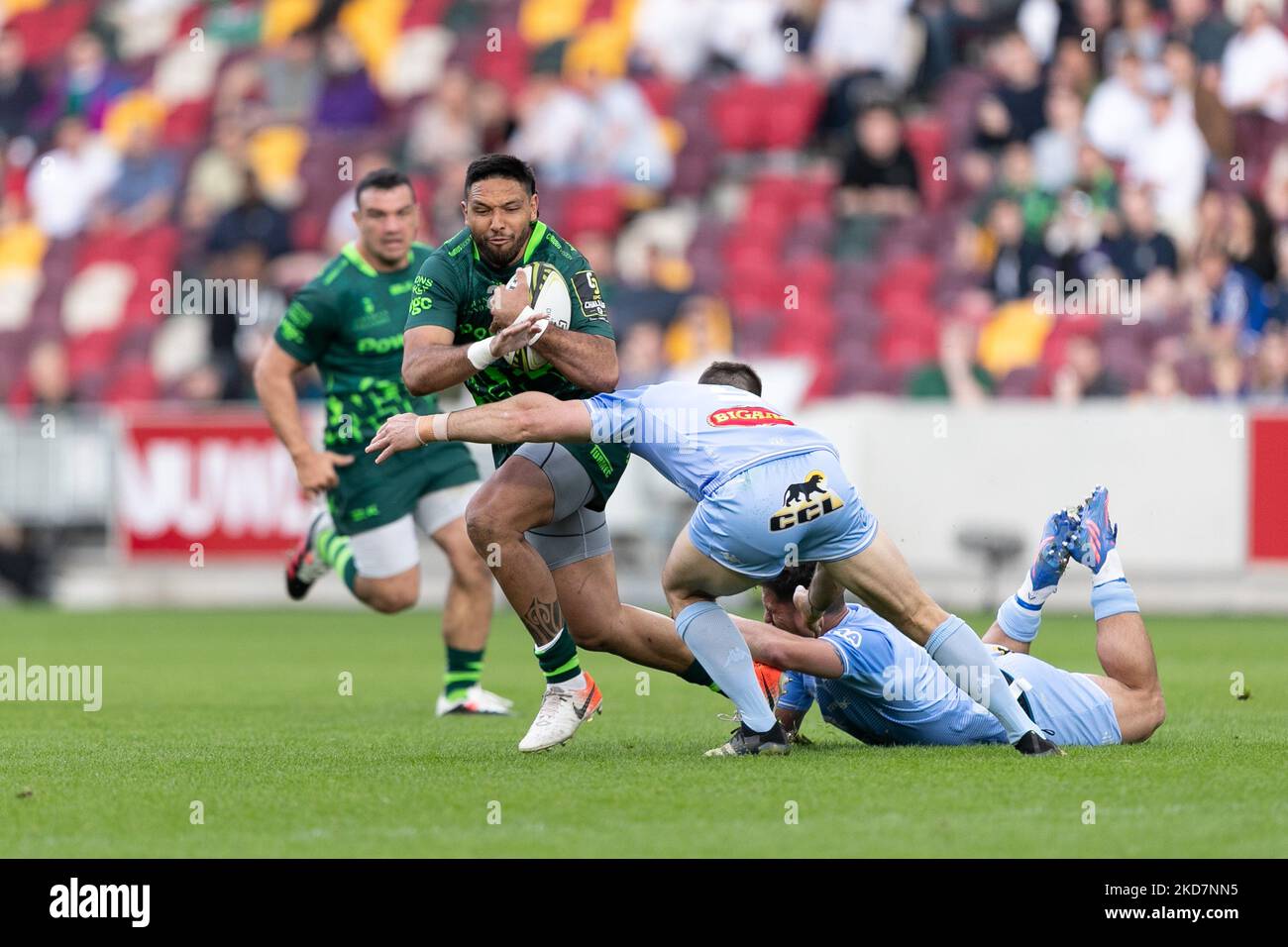Curtis Rona of London Irish is tackled by Jeremy Fernandez of Castres ...