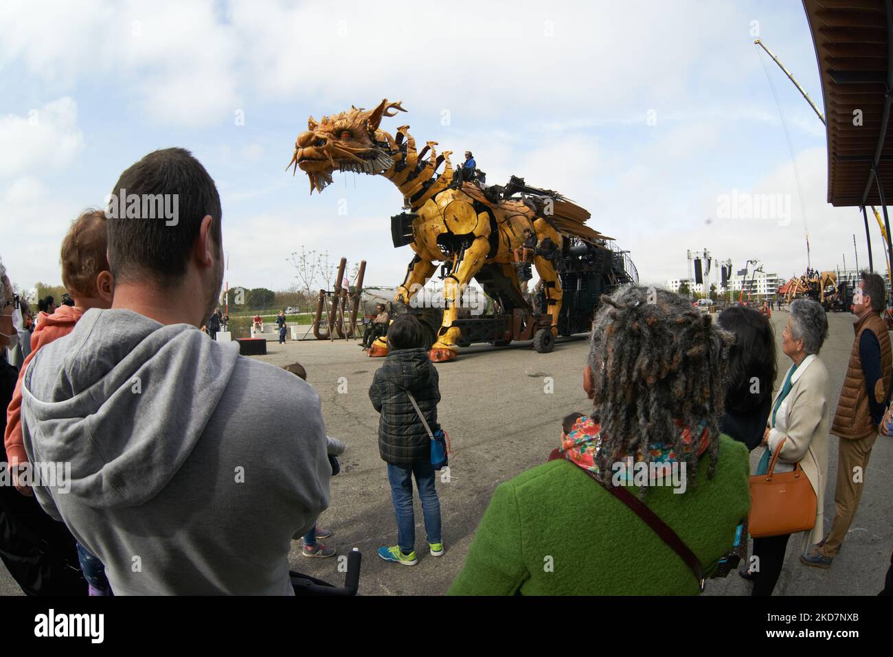 People look at the rehearsal. A robot, a mare-dragon called Long-Ma ...