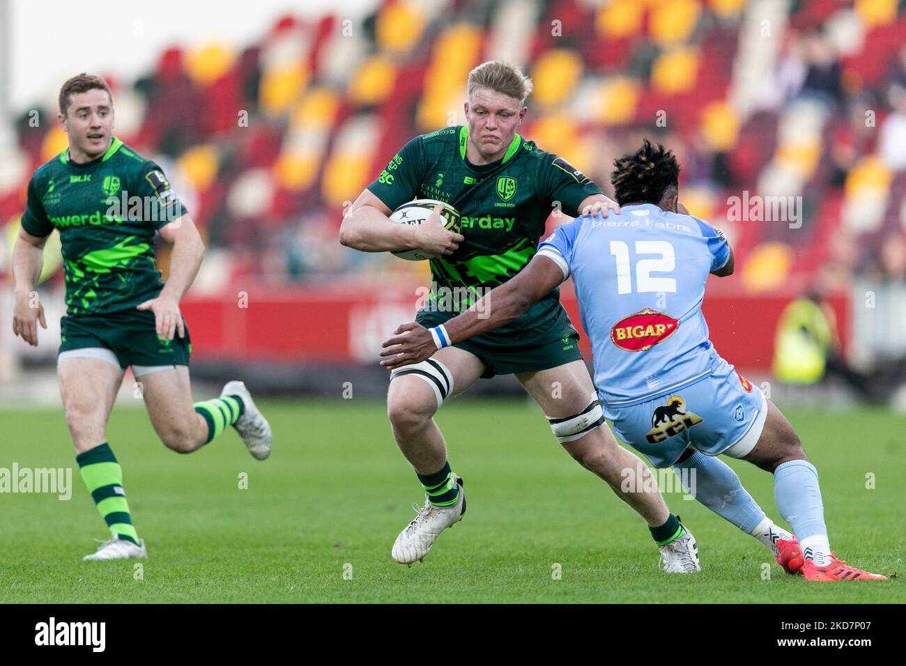 Tom Pearson of London Irish is tackled by Andrea Cocagi during the ...