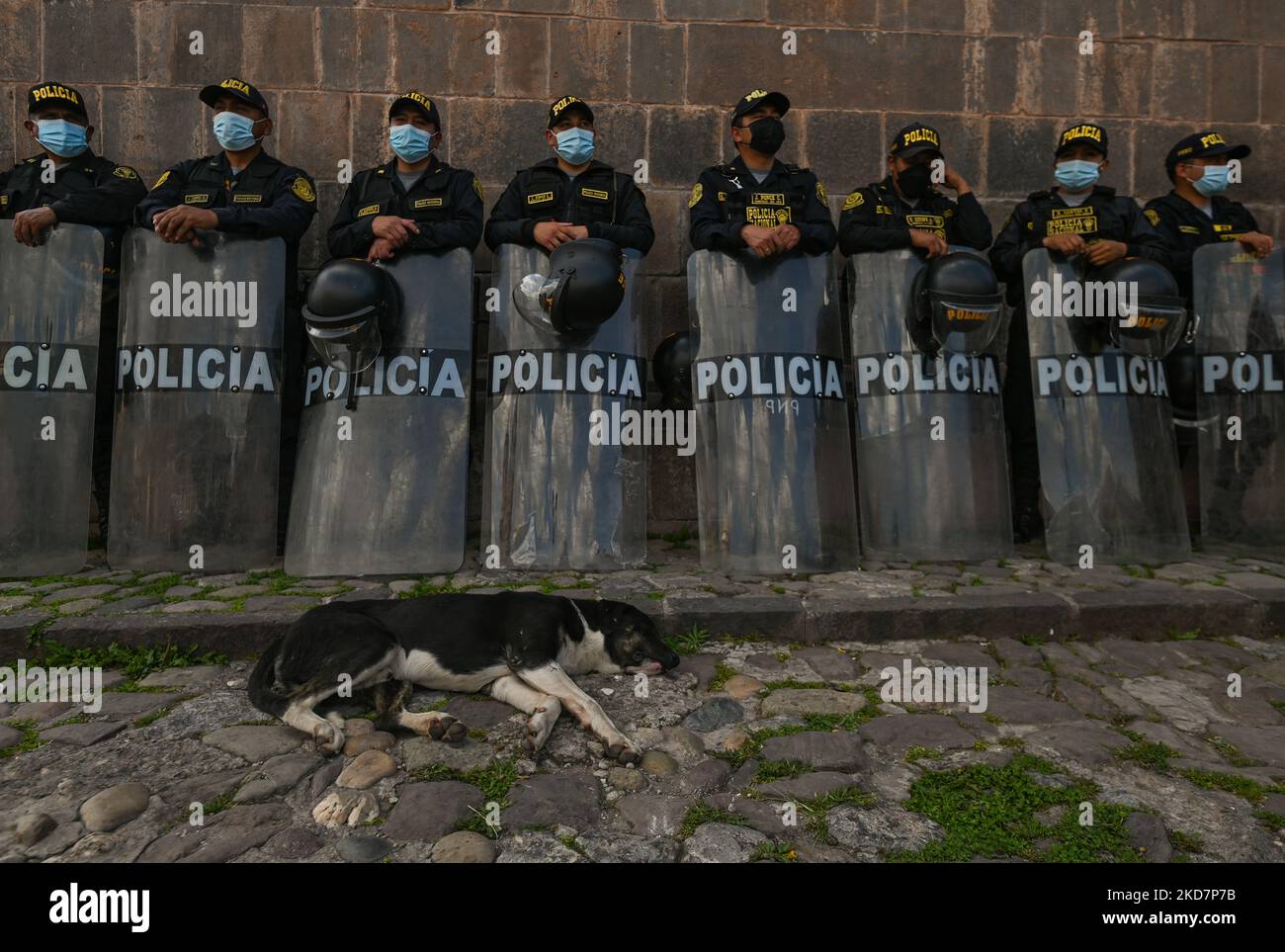 Members of the local Police Prevention Unit seen lining along the Cusco ...