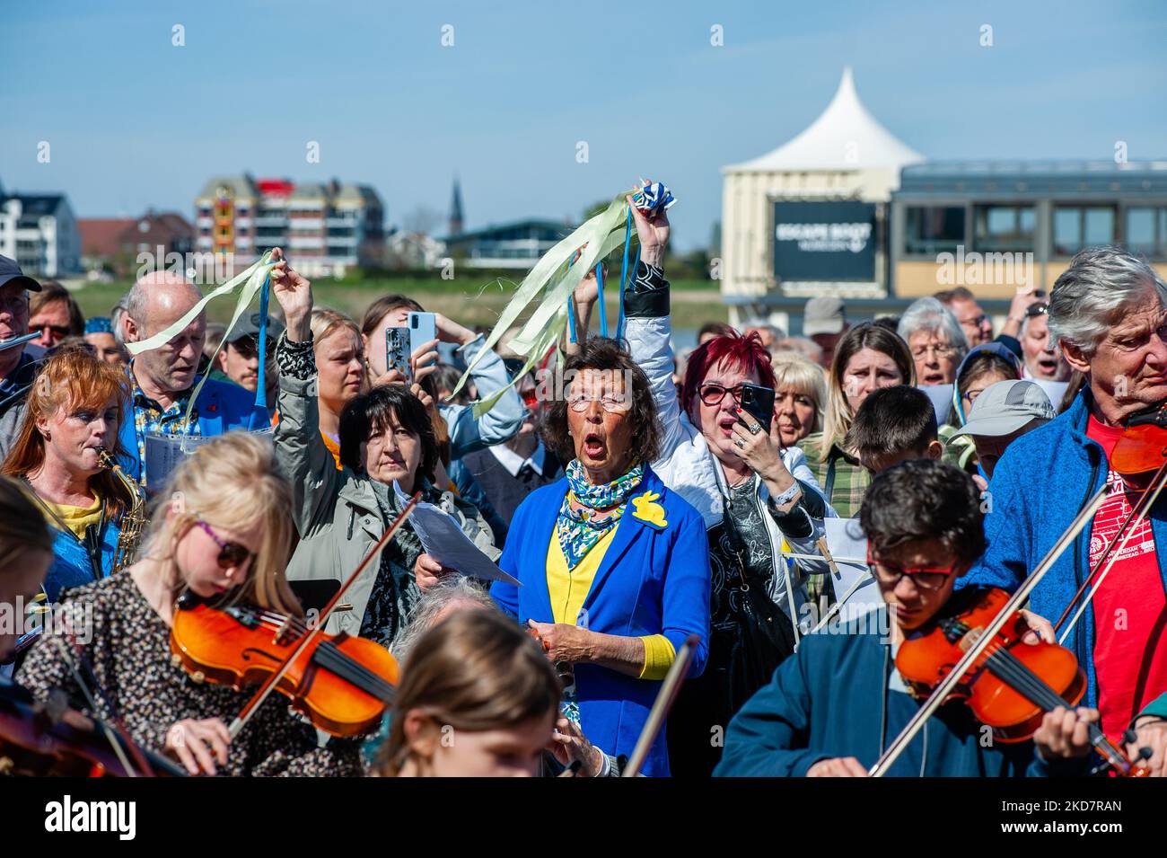 Musicians are playing and singing the Ukrainian national anthem, during ...