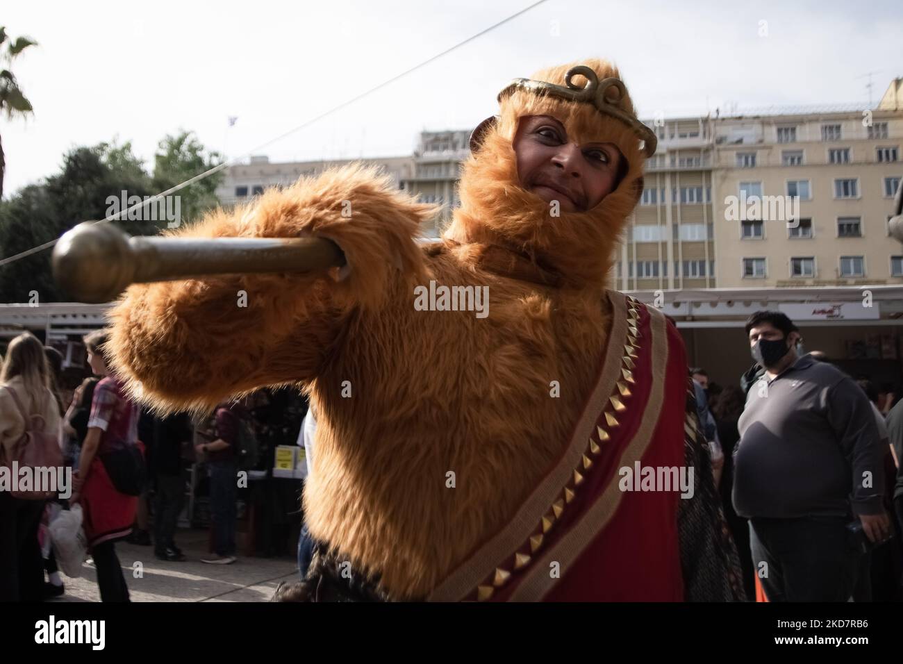 Cosplayers dressed as their favourite characters stand for a photo ...