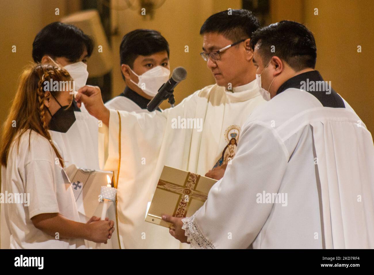 A catholic church held an Easter Vigil Mass during Black Saturday in ...