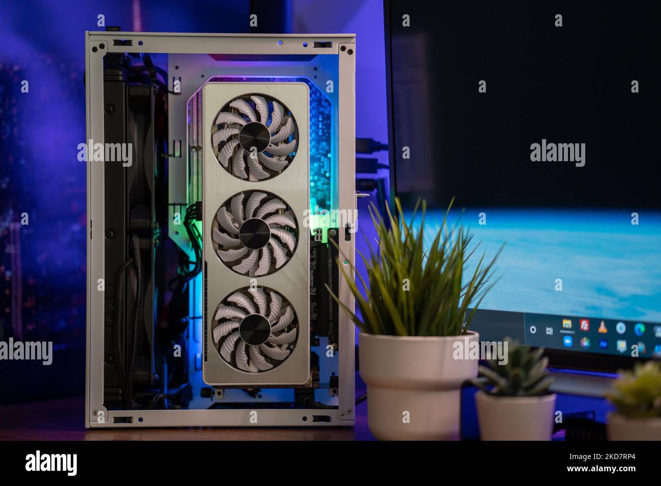 A closeup shot of a PC and peripheral device with cooling in neon ...