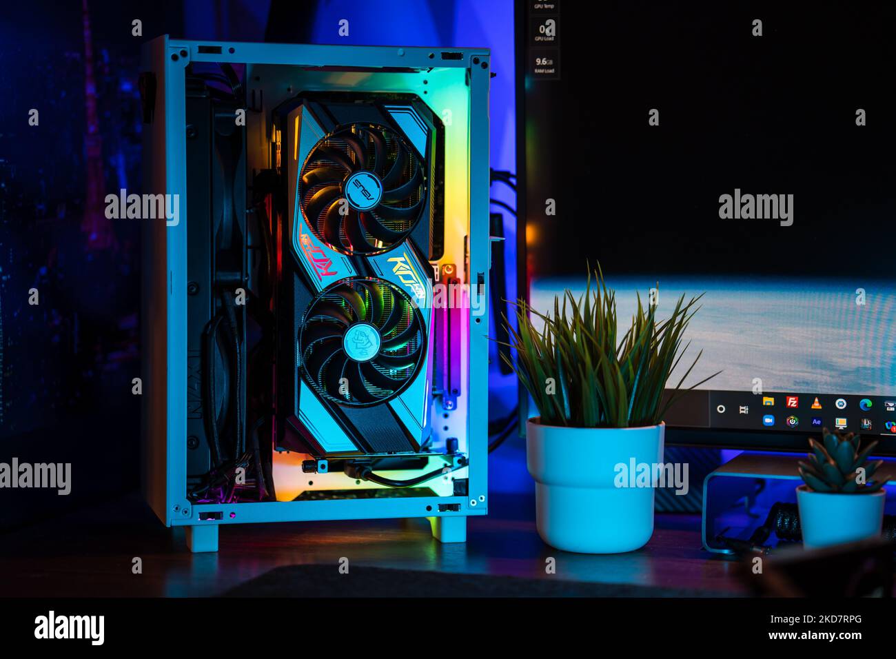 A closeup shot of a PC and peripheral device with cooling in neon ...
