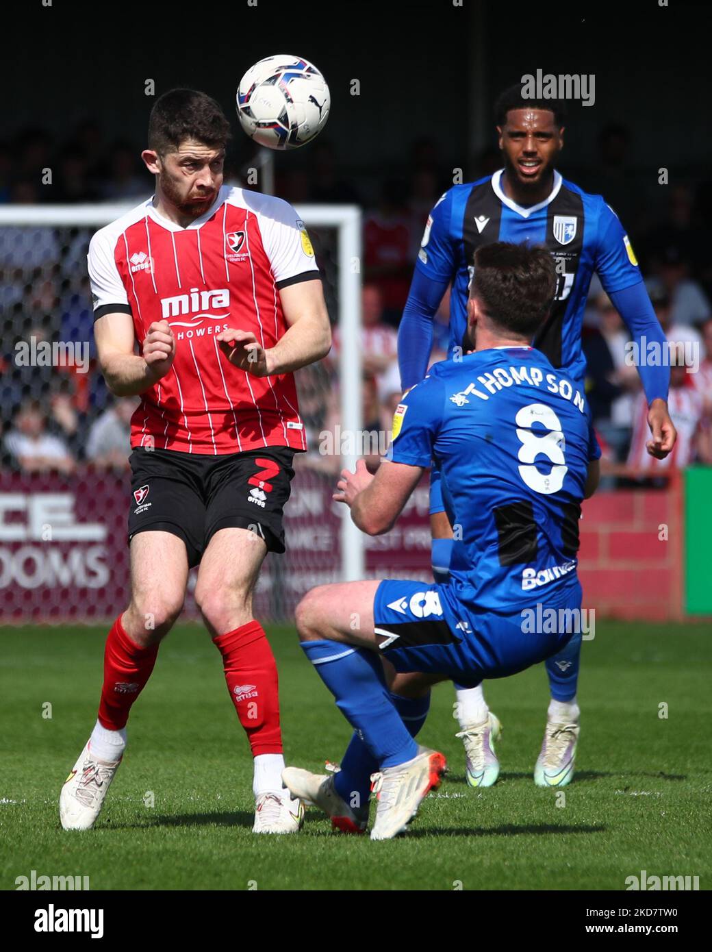 Sean Long of Cheltenham Town heads the ball forward during the Sky Bet ...