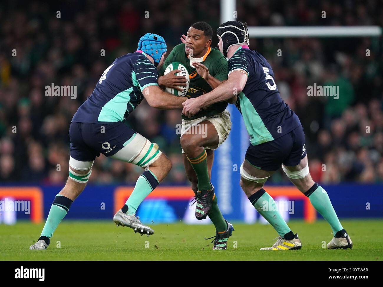 South Africa's Damian Willemse (centre) tackled by Ireland's Tadhg ...