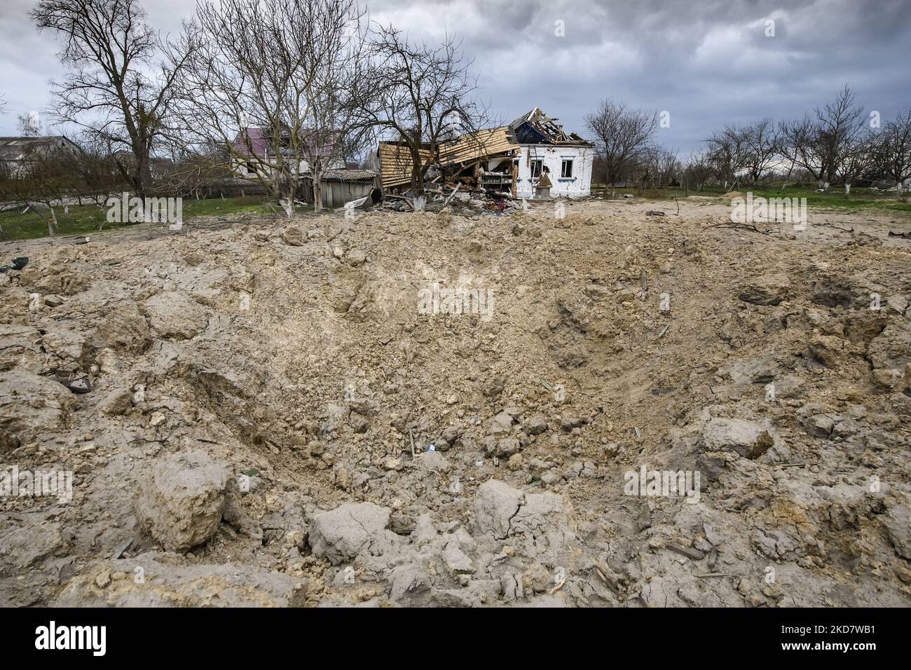 Giant crater from explosion of russian air bomb among of residental ...