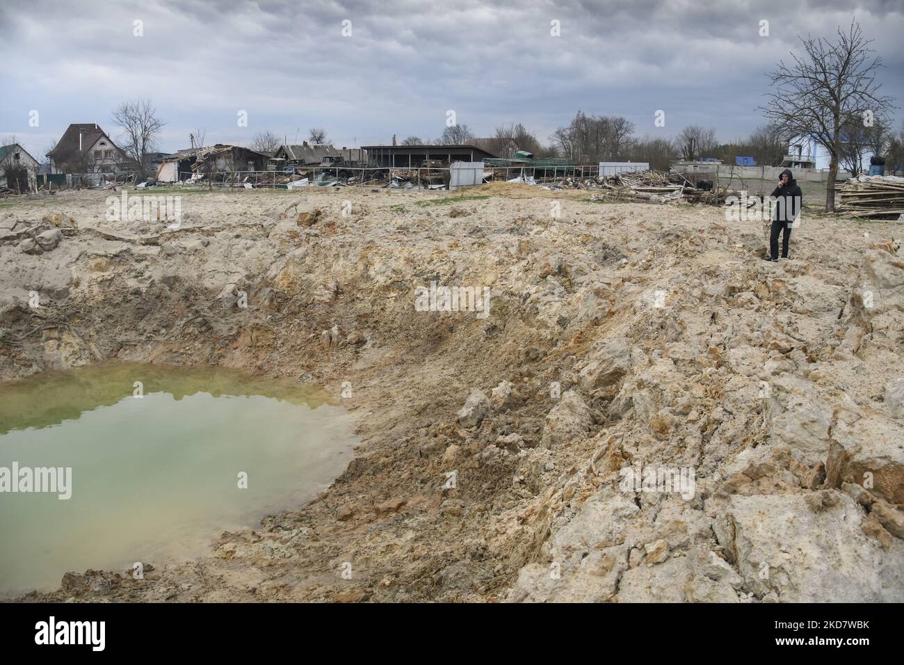 Giant crater from explosion of russian air bomb among of residental ...