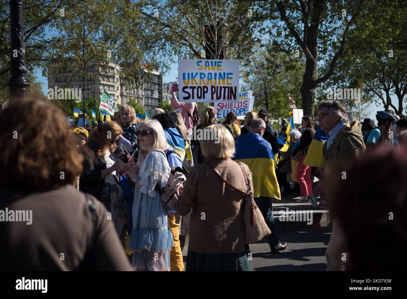 Save Ukraine stop Putin says a sign seen at the march against Russia's ...