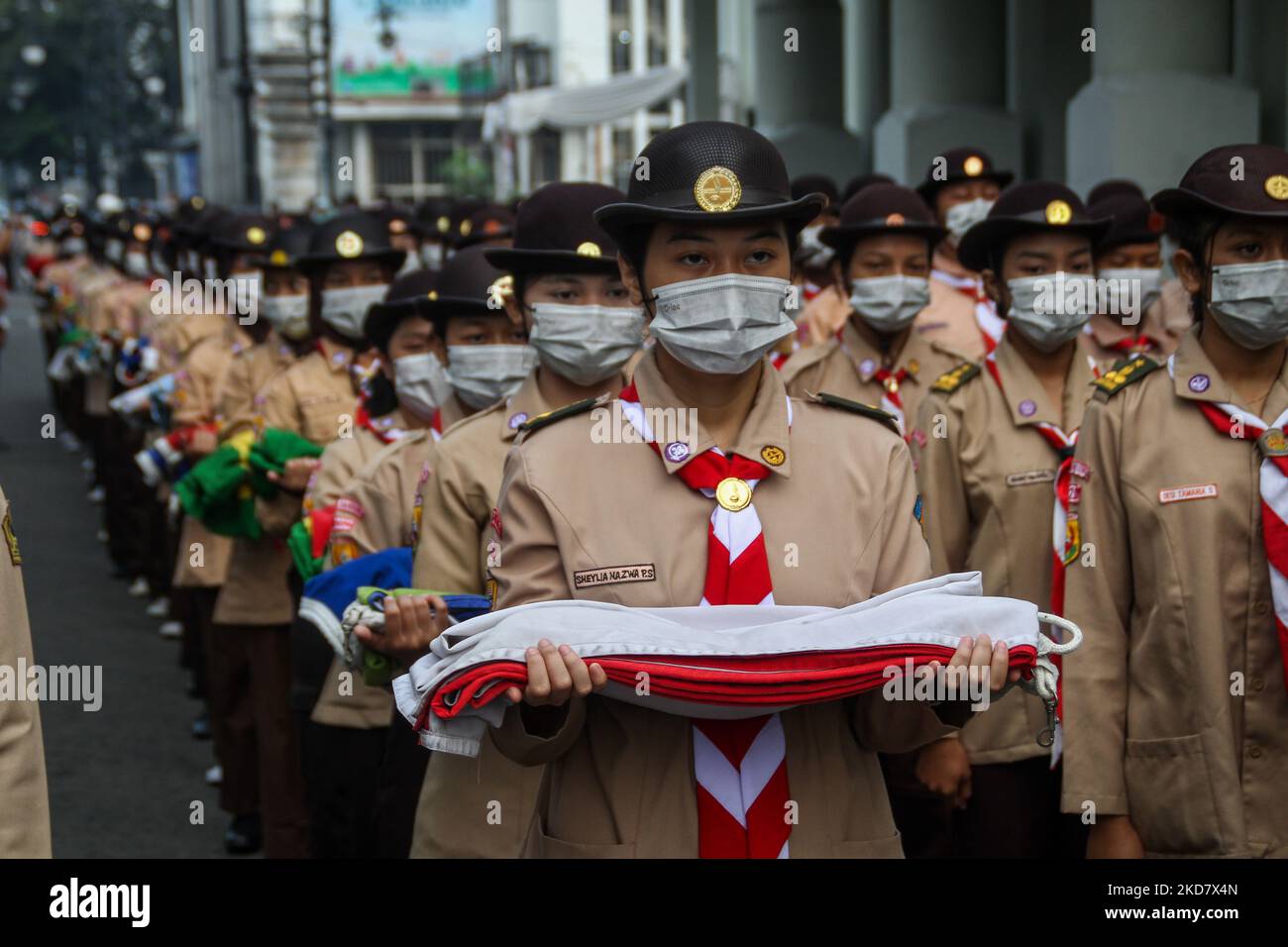 Scout members march during the 67th anniversary of the Asian African ...