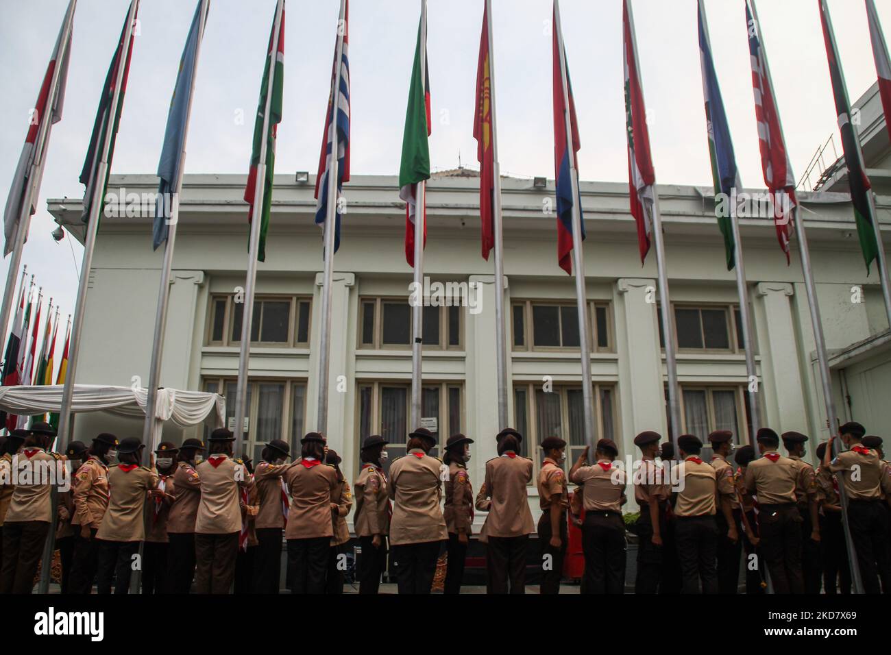 Scout members march during the 67th anniversary of the Asian African ...