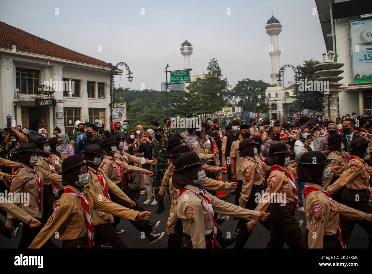 Scout members march during the 67th anniversary of the Asian African ...