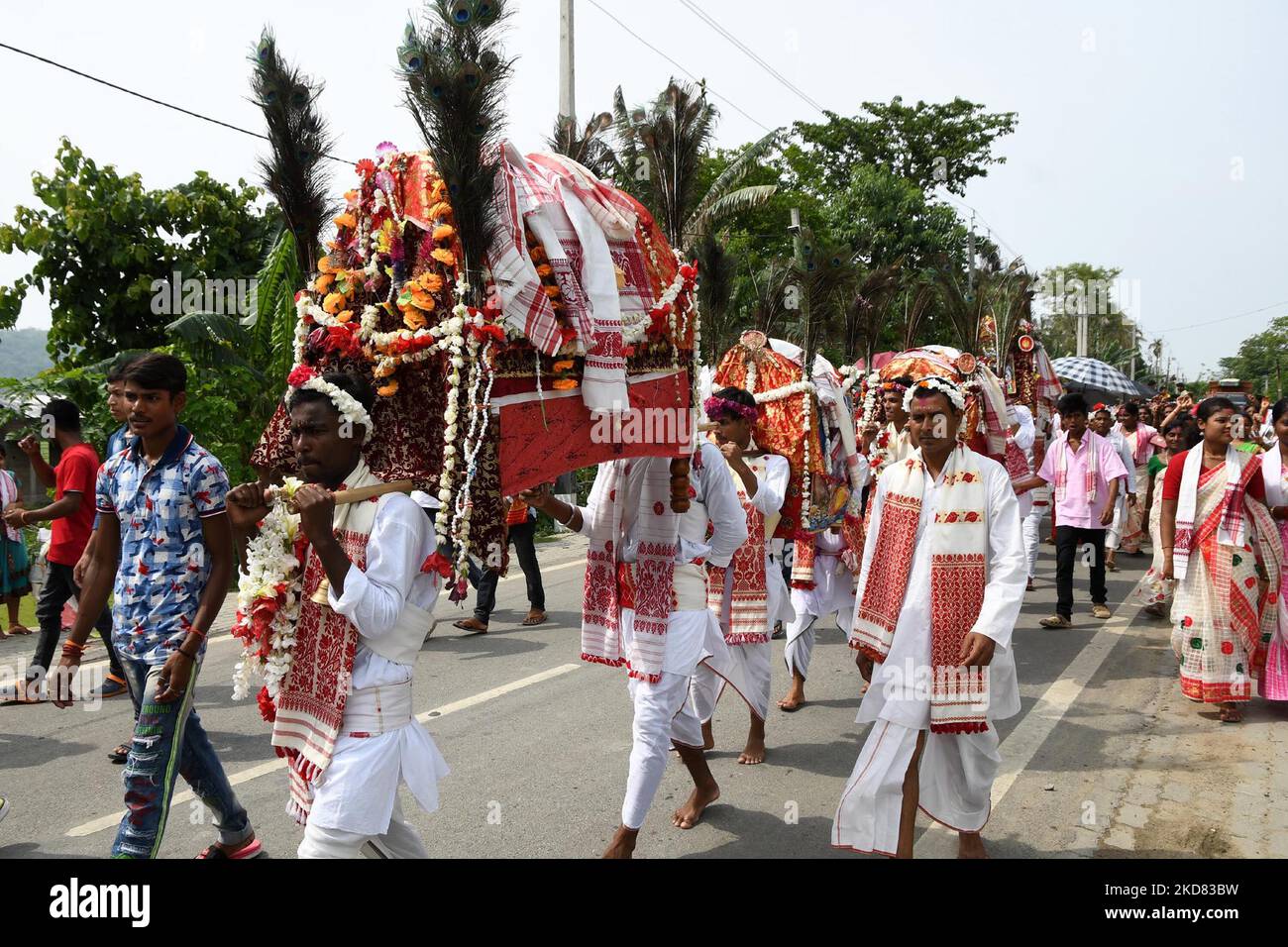 Villagers participate in a religious procession during the traditional ...