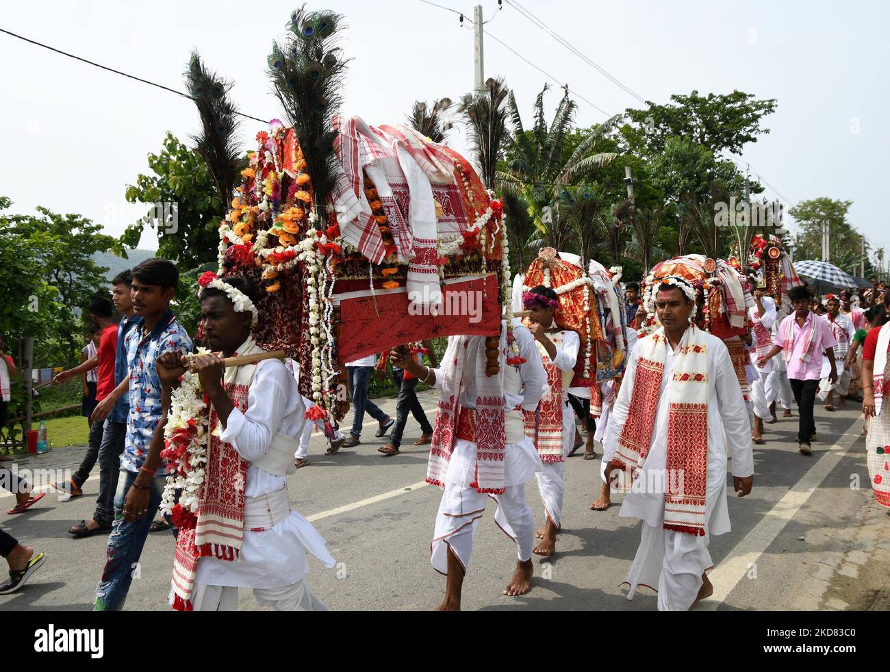 Villagers participate in a religious procession during the traditional ...