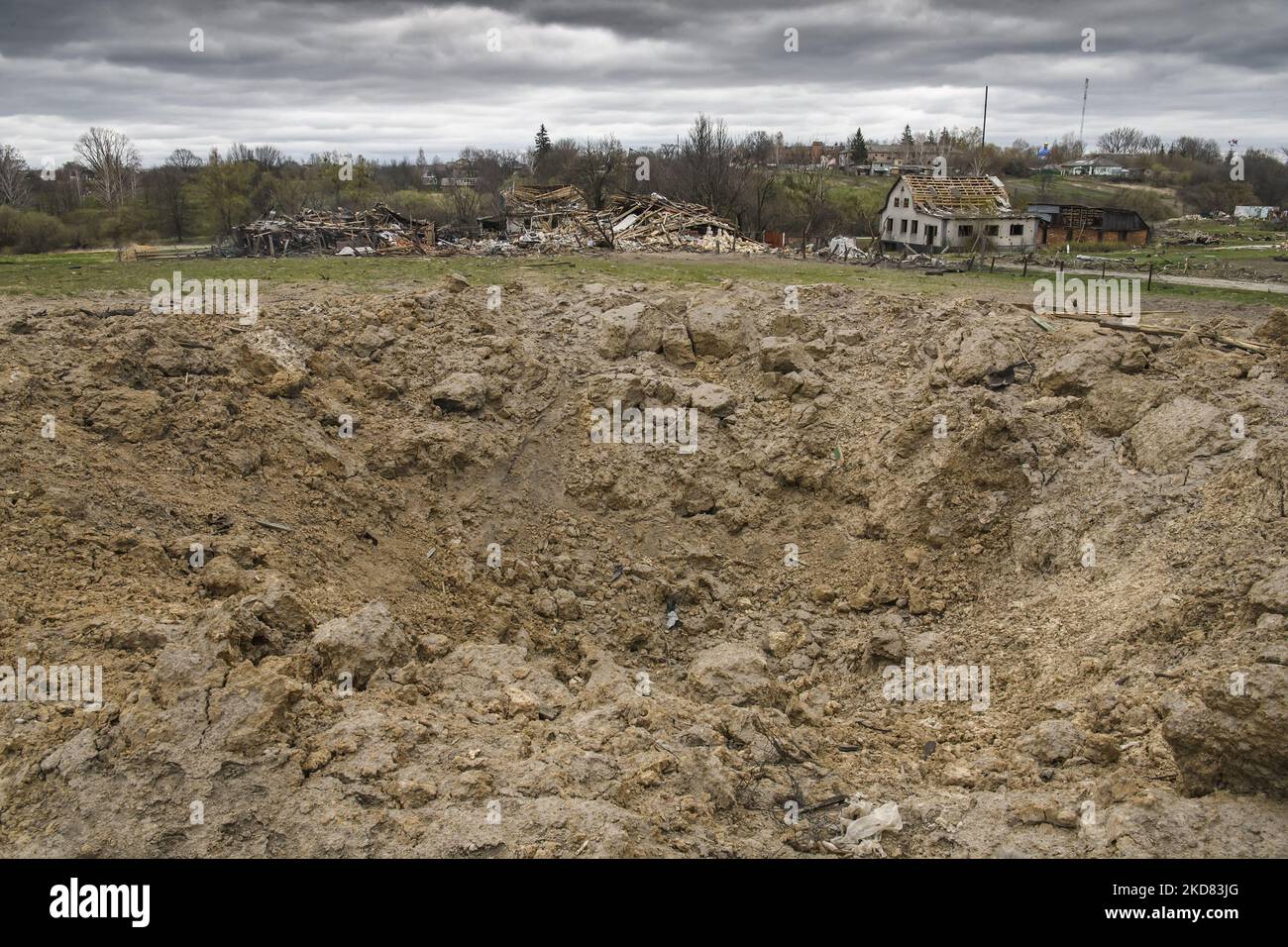 Giant crater from explosion of russian air bomb among of residental ...