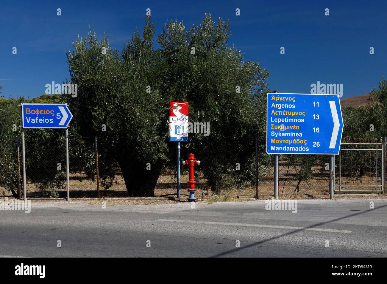 Blue and white road signs. Bilingual. Lesbos views. Signs.cym Stock ...