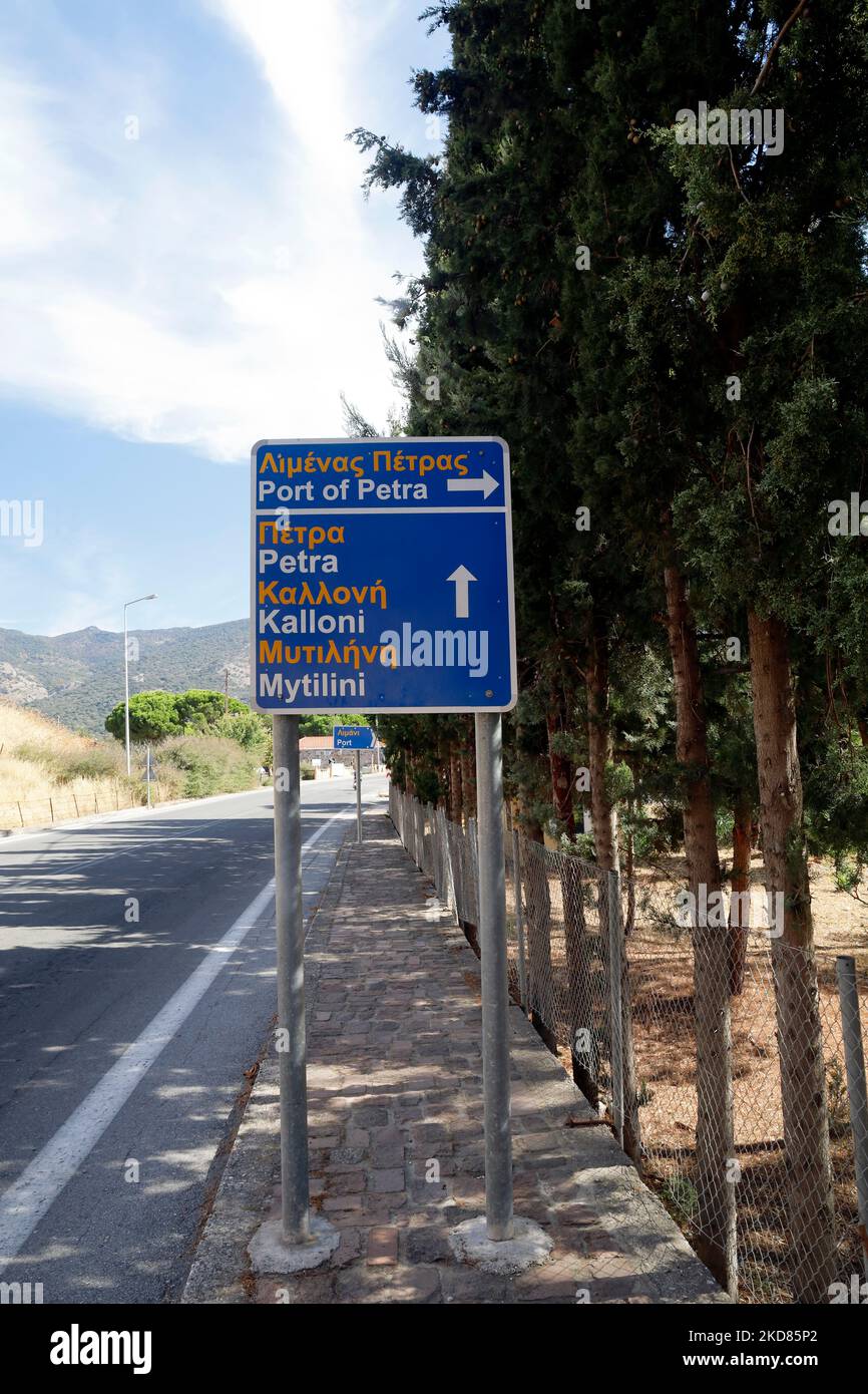 Blue and white road signs. Bilingual. Lesbos views. Signs. Petra ...