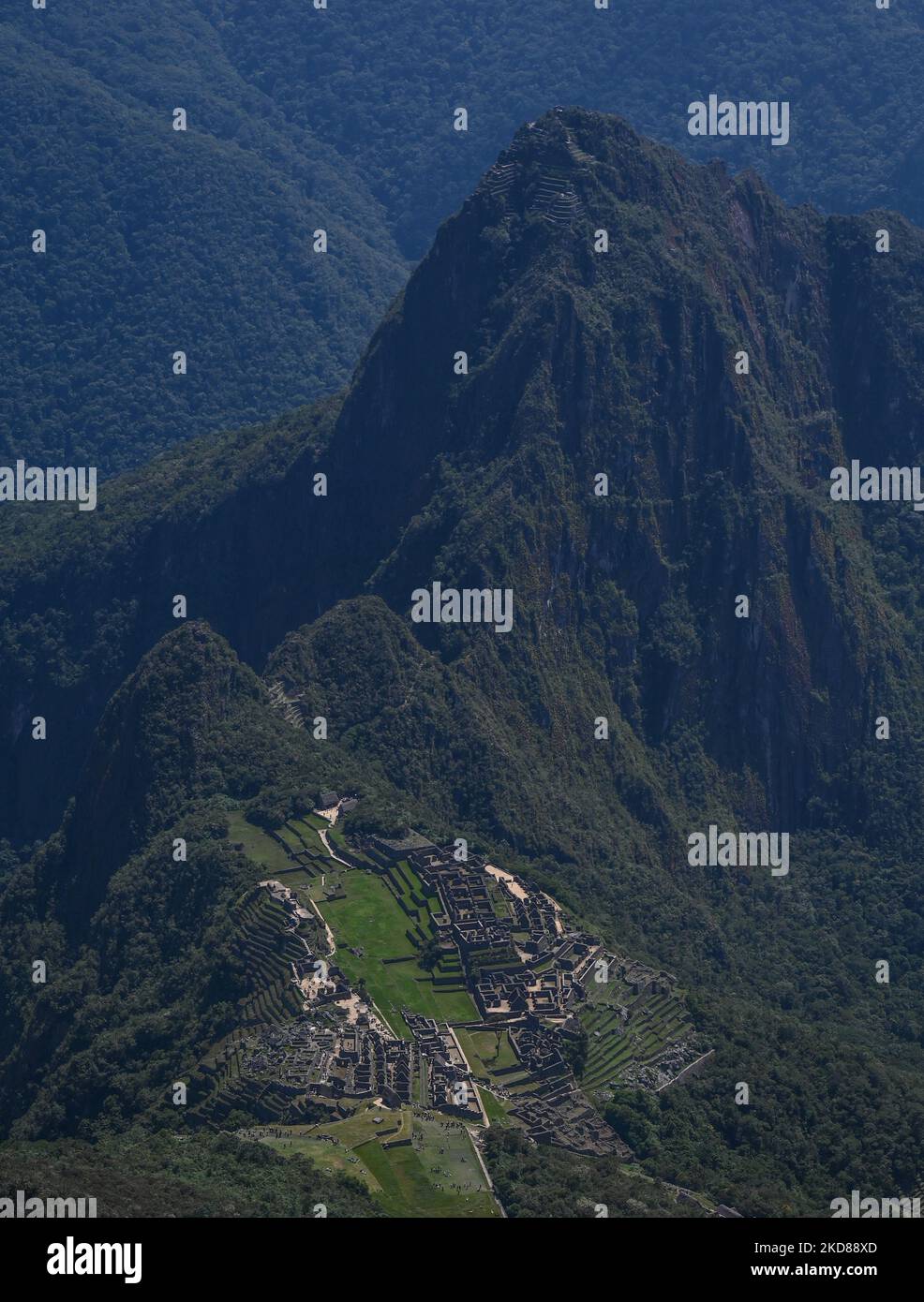 View of the ancient Inca city of Machu Picchu located in the Andes at ...