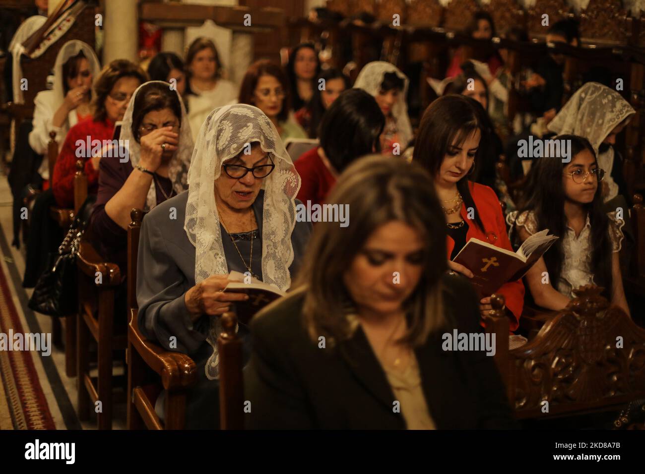 Palestinian Christians attend an Orthodox service during Easter night ...