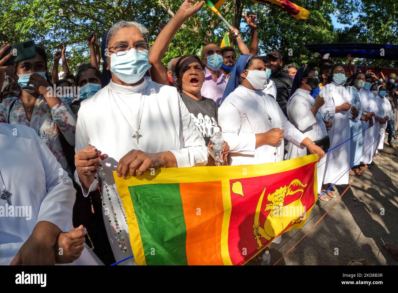 Sri Lankan catholic nuns shield the protesters during a protest near ...