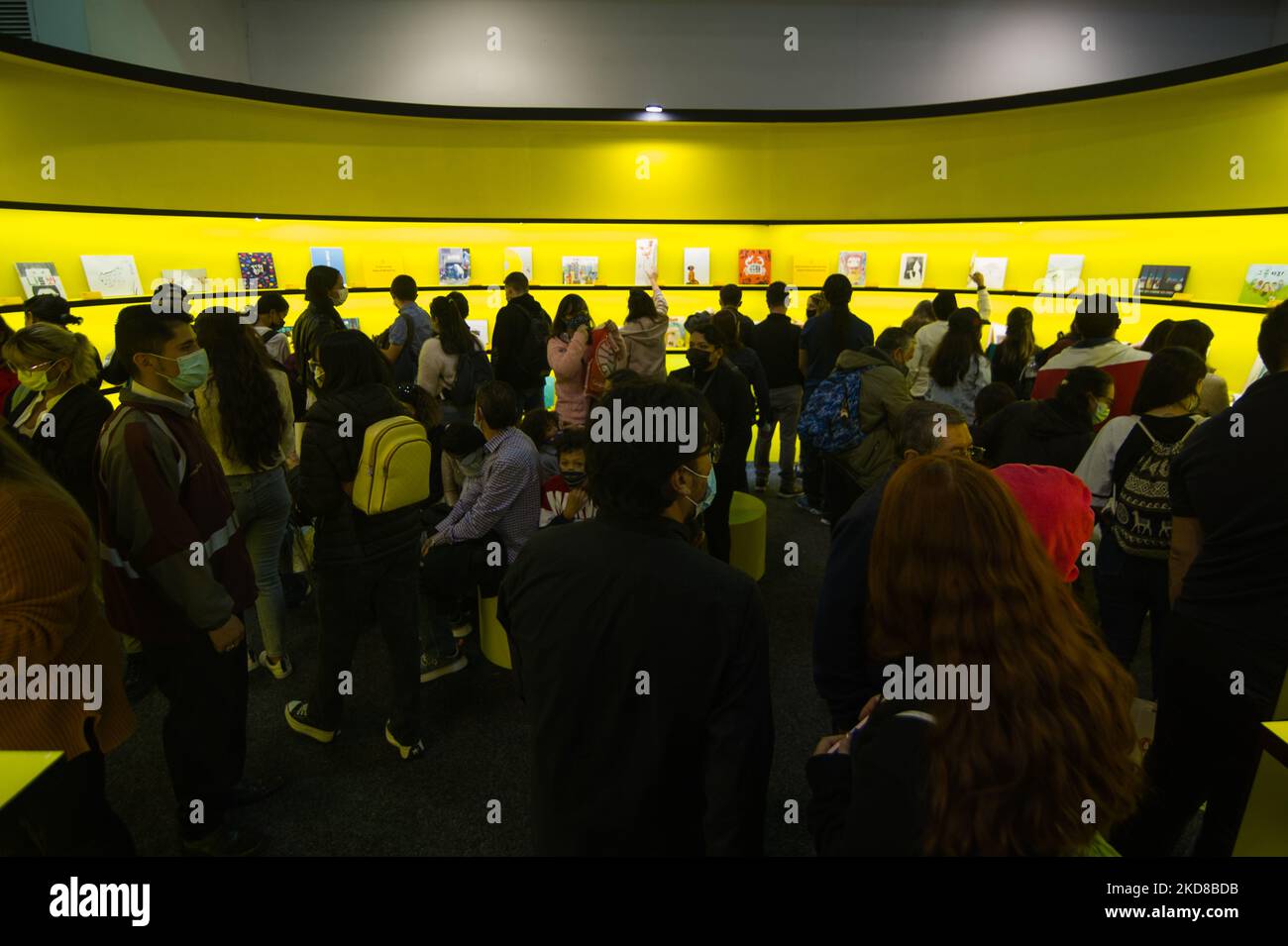 Attendees see and read Korean ilustrated books during the first sunday ...