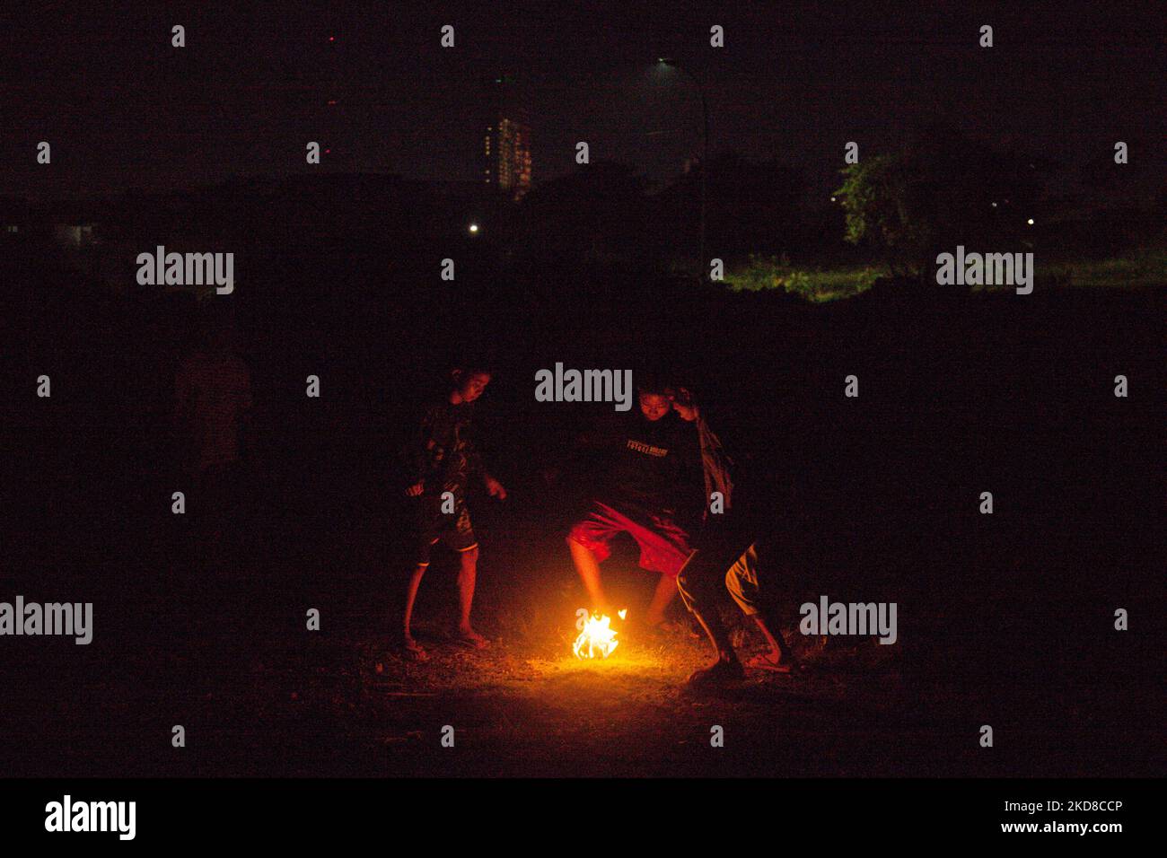 SURABAYA, INDONESIA, APRIL 24: Children's play the traditional game of ...