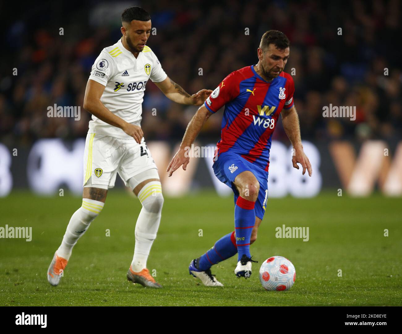 : L-R Sam Greenwood of Leeds United and Crystal Palace's James McArthur ...