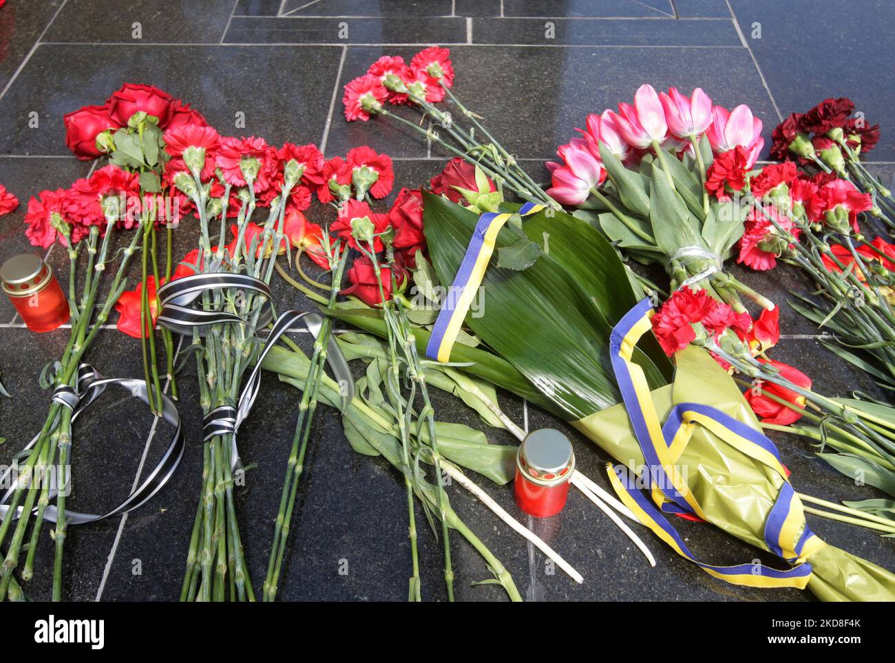 Flowers are seen at a memorial of victims of the Chernobyl accident, in ...