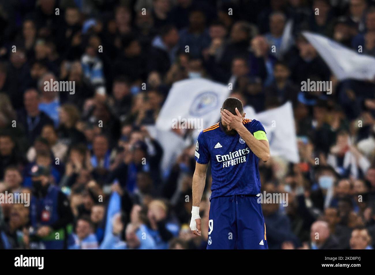Karim Benzema of Real Madrid dejected after third Manchester goal ...