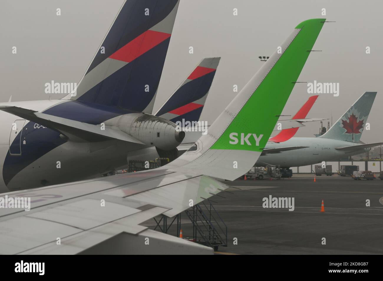 LATAM Airlines, Air Canada and SKY Airline planes seen at Jorge Chavez ...