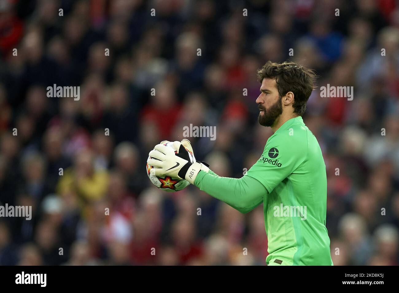 Alisson Becker of Liverpool makes a save during the UEFA Champions ...