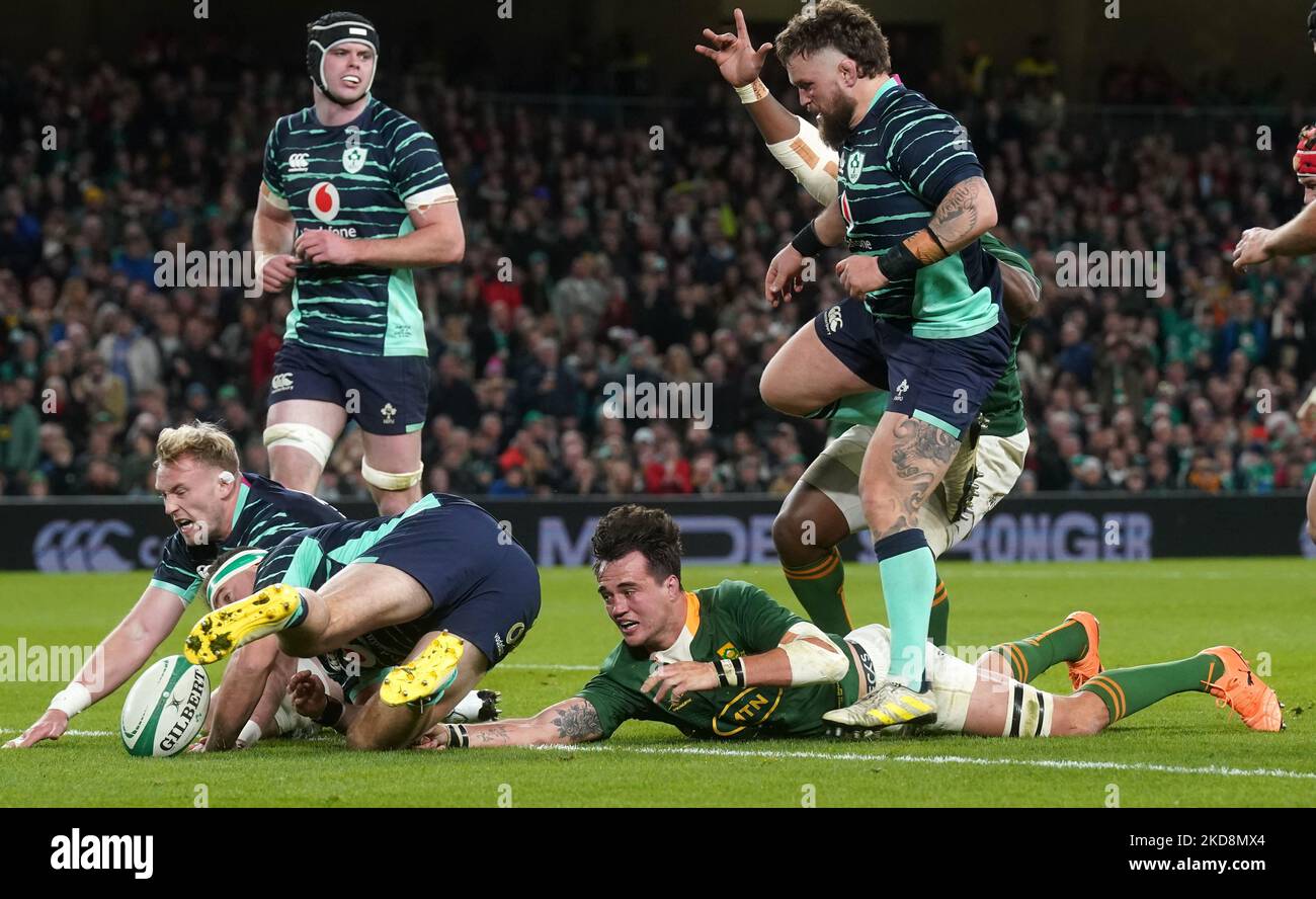 South Africa's Franco Mostert celebrates scoring their side's first try ...