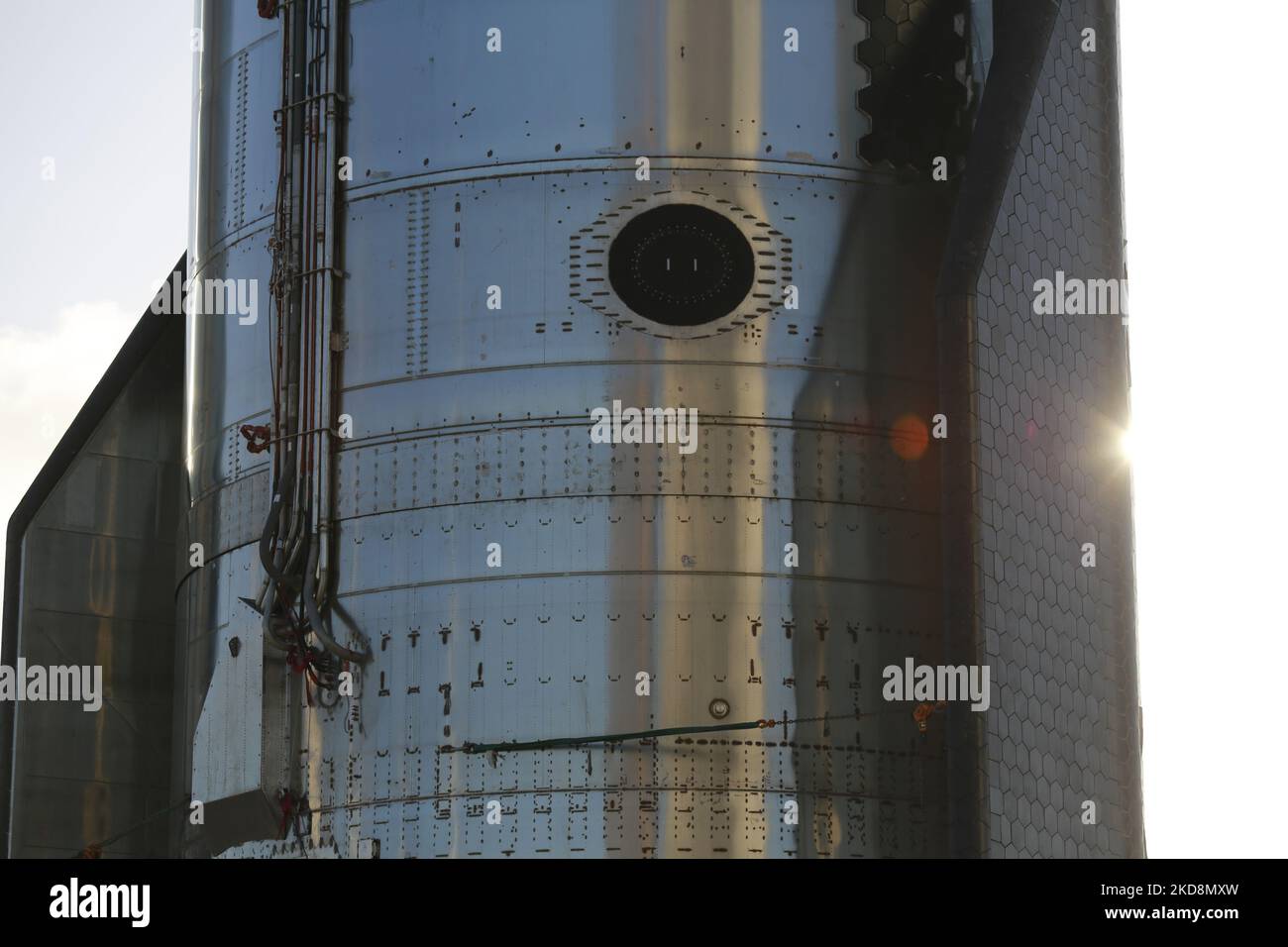 Starship 22 stands behind the build site at SpaceX's South Texas campus ...