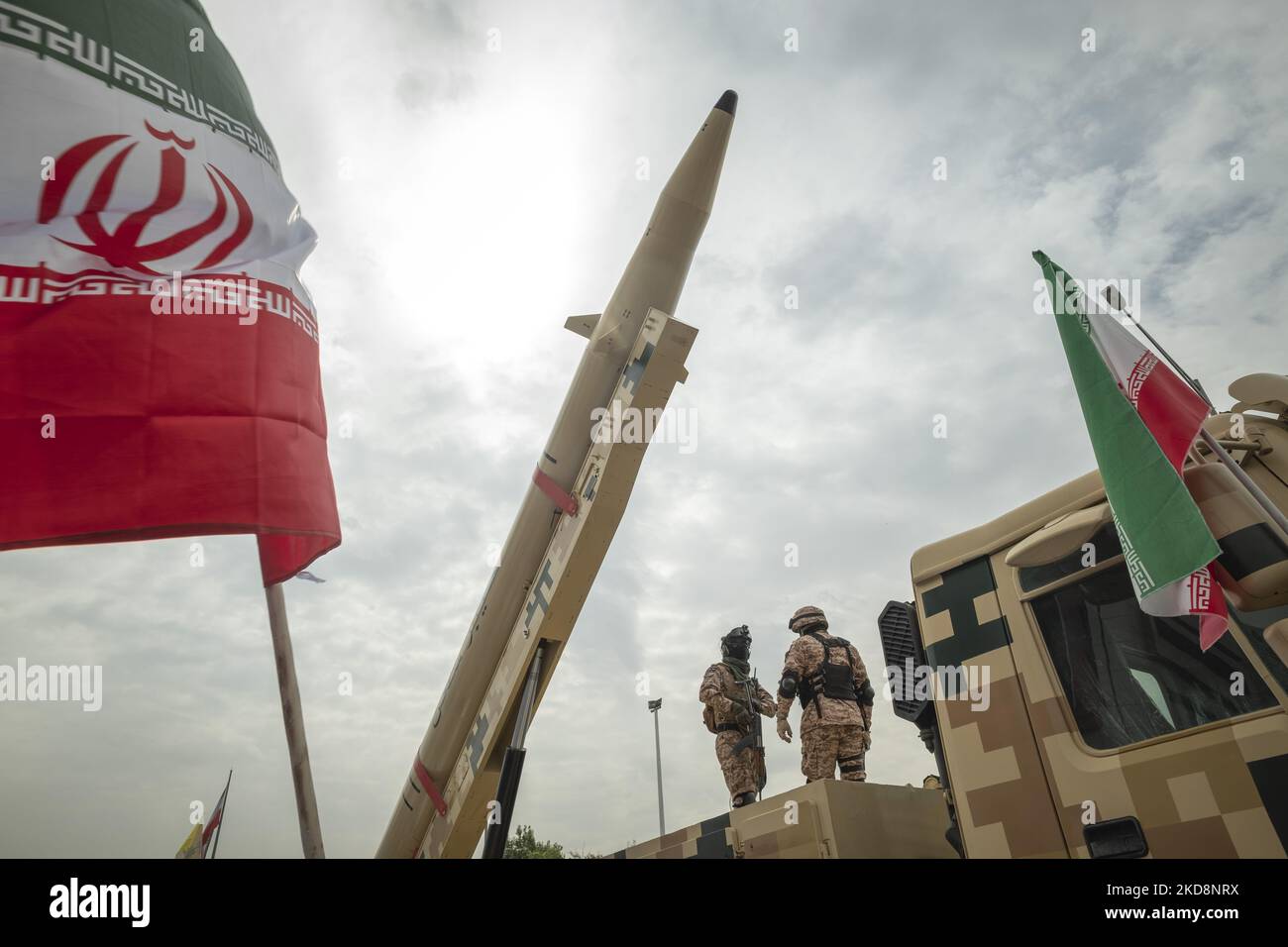 Two Islamic Revolutionary Guard Corps (IRGC) military personnel stand ...