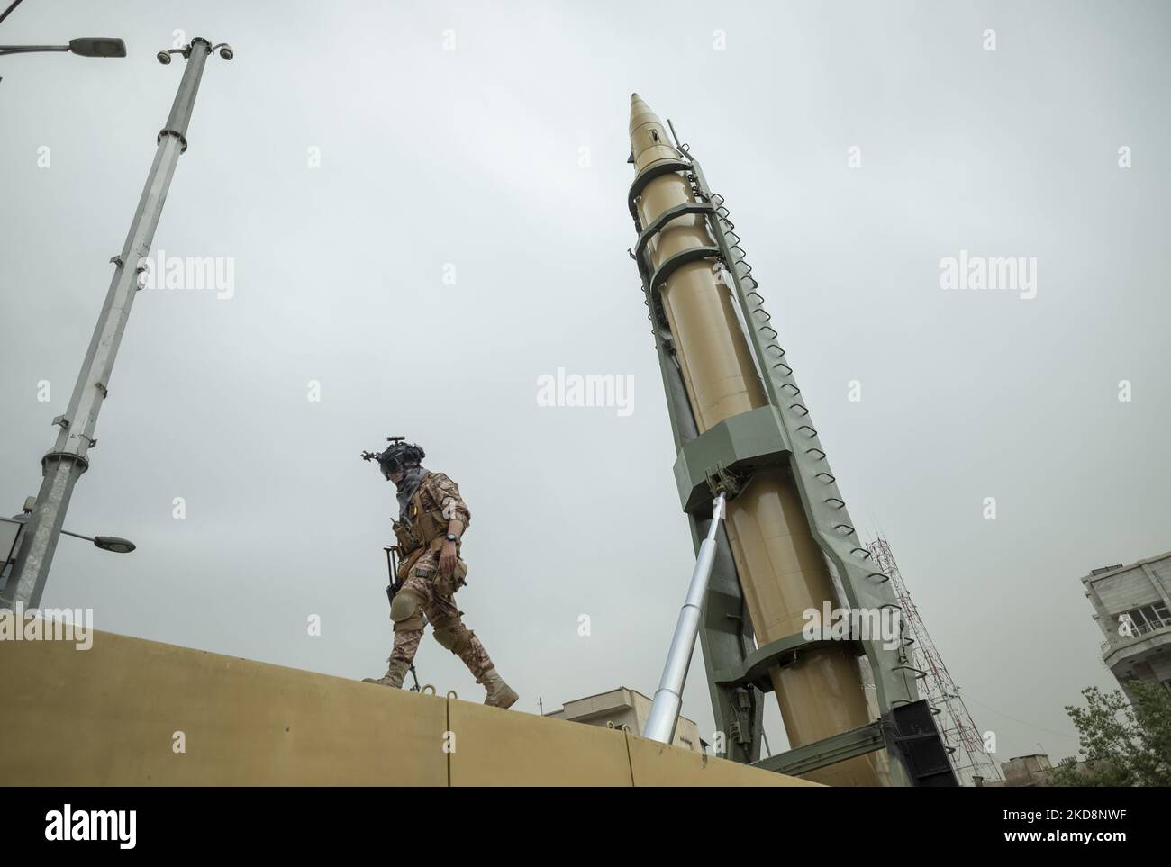 An Islamic Revolutionary Guard Corps (IRGC) military personnel walks ...