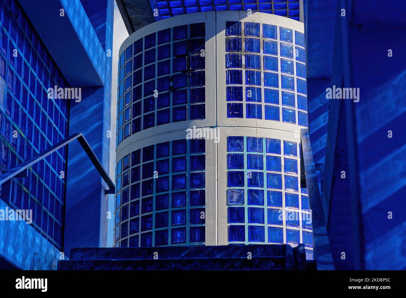 Blue colored glass block corridor and staircase Stock Photo - Alamy