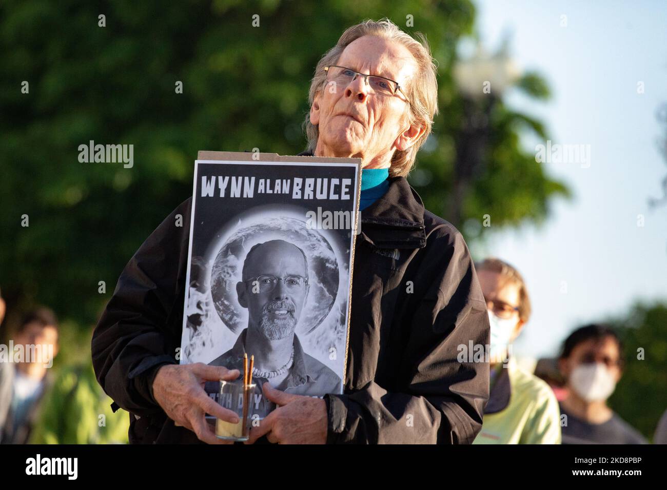 People perfrorm a walking meditation during a vigil at the Supreme ...