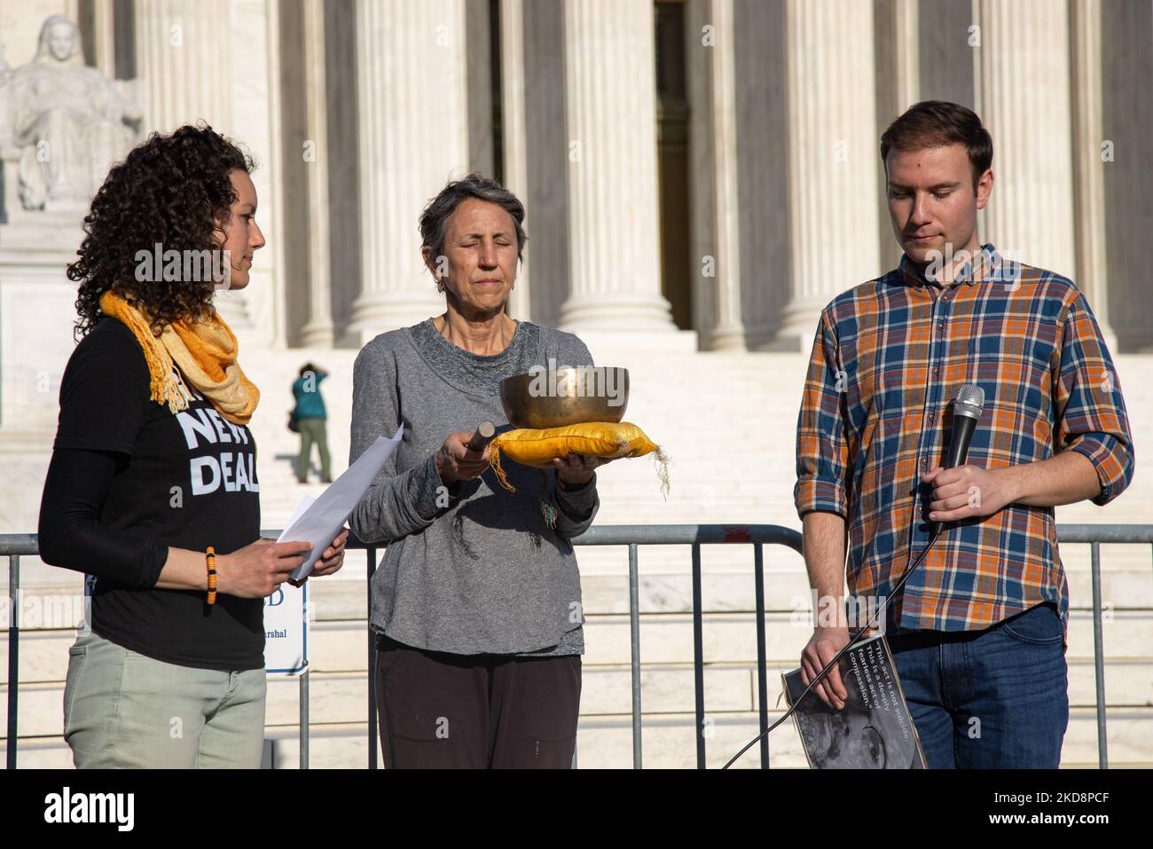 People attend a vigil at the Supreme Court building in Washington, D.C ...