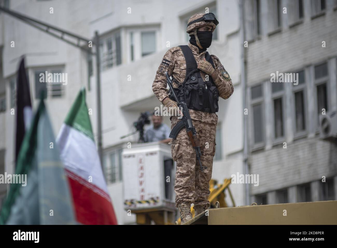 An Islamic Revolutionary Guard Corps (IRGC) military personnel monitors ...