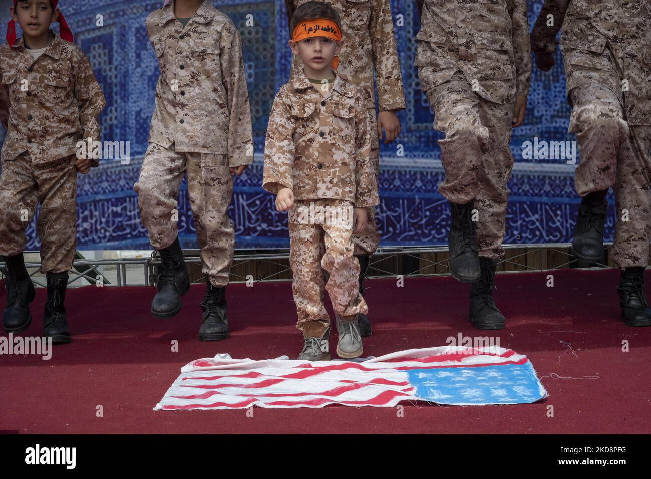 An Iranian schoolboy wearing an Islamic Revolutionary Guard Corps (IRGC ...