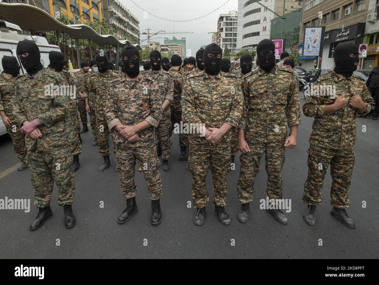 Islamic Revolutionary Guard Corps (IRGC) military personnel stand guard ...