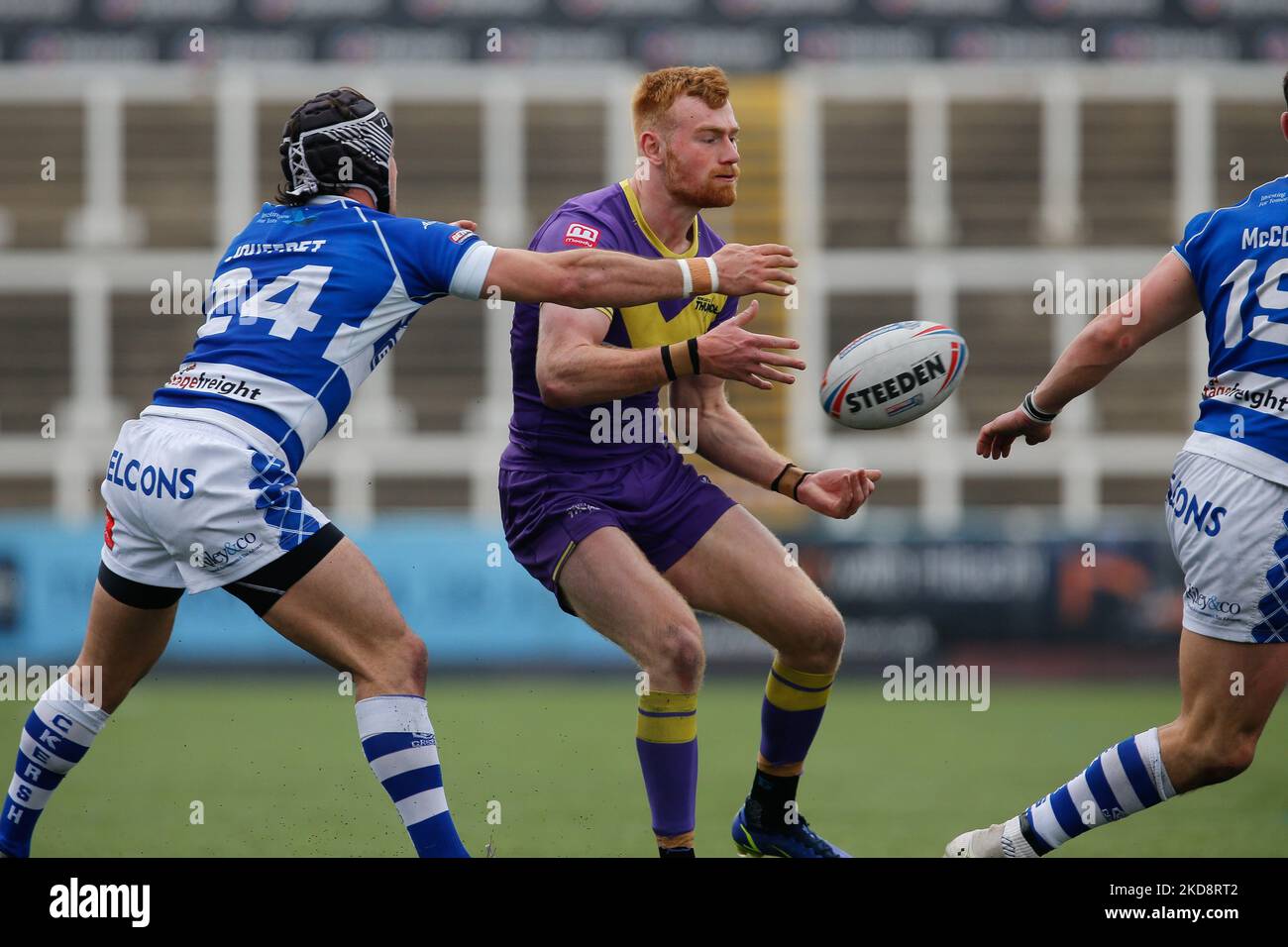 Alex Donaghy of Newcastle Thunder offloads during the BETFRED ...