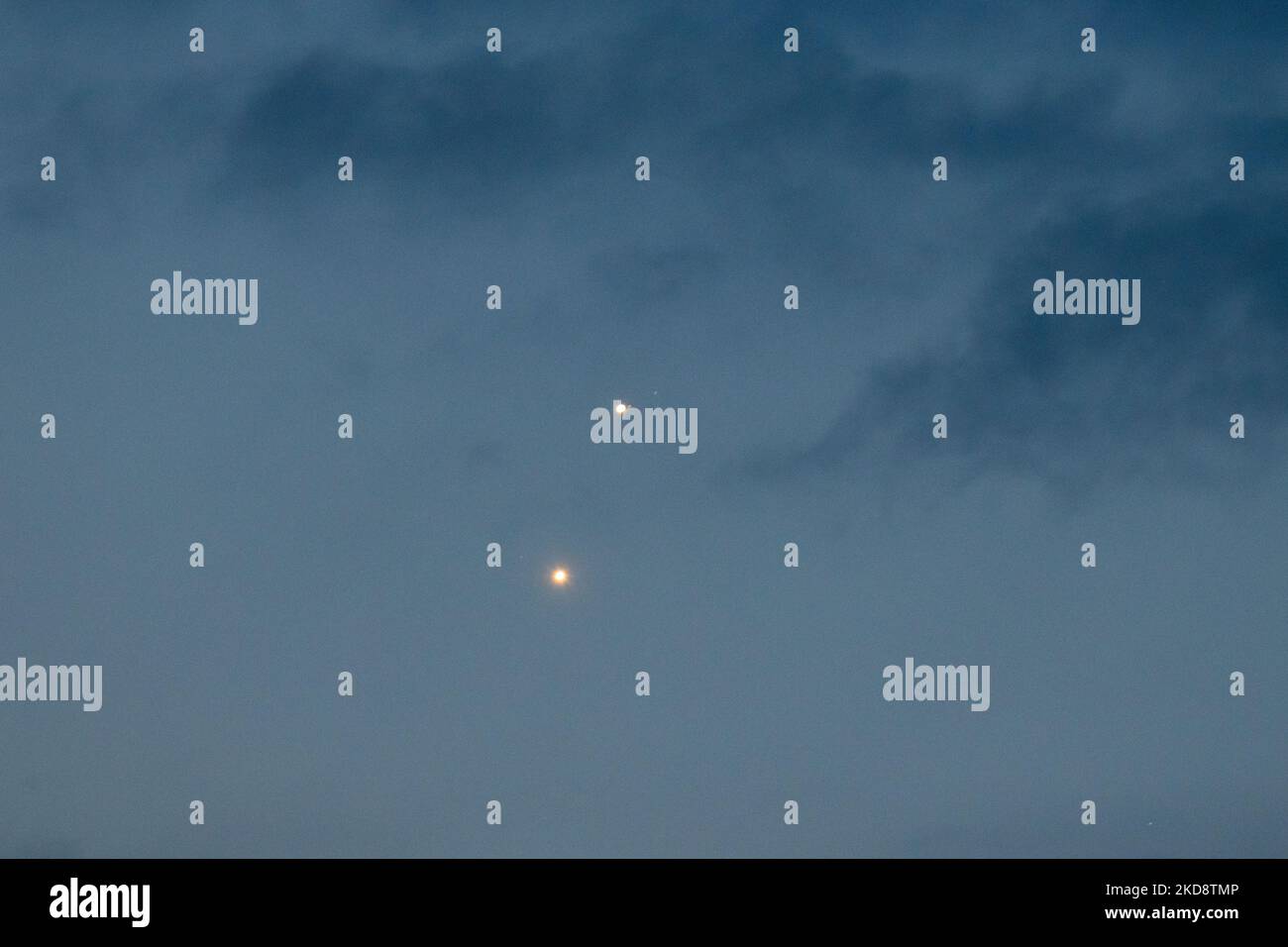 Planets Jupiter and Venus in conjunction rise before sunrise behind Rocca Calascio castle, Italy ...