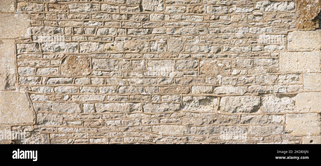 Old stone wall pattern or texture with corner stones. Detail of an ...