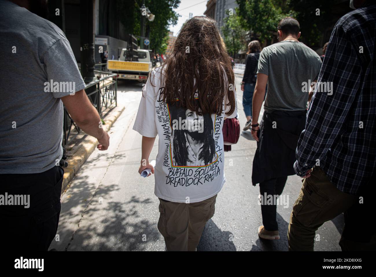 A girl with a Bob Marley shirt at the International Workers' Day ...